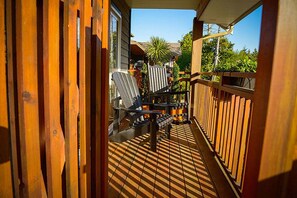 Suite Signature, 1 cama king-size, vista para a baía | Terraço/pátio interior