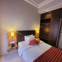 Quarto Individual, 1 quarto | Cortinas/cortinados opacos, Wi-fi grátis, roupa de cama fornecida