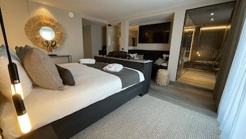 Suíte exclusiva | 1 quarto, roupas de cama premium, frigobar (abastecido com itens grátis)