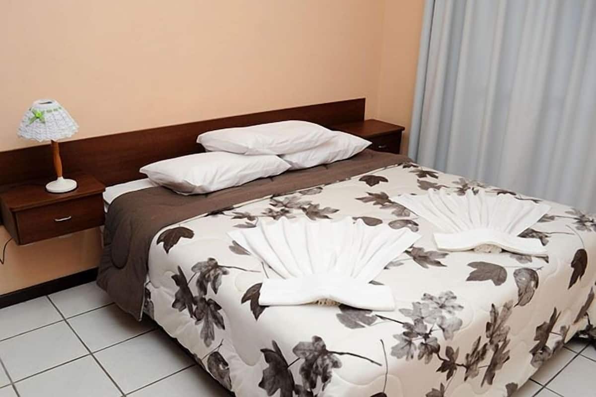 Quarto Quádruplo | Minibar, Wi-fi grátis