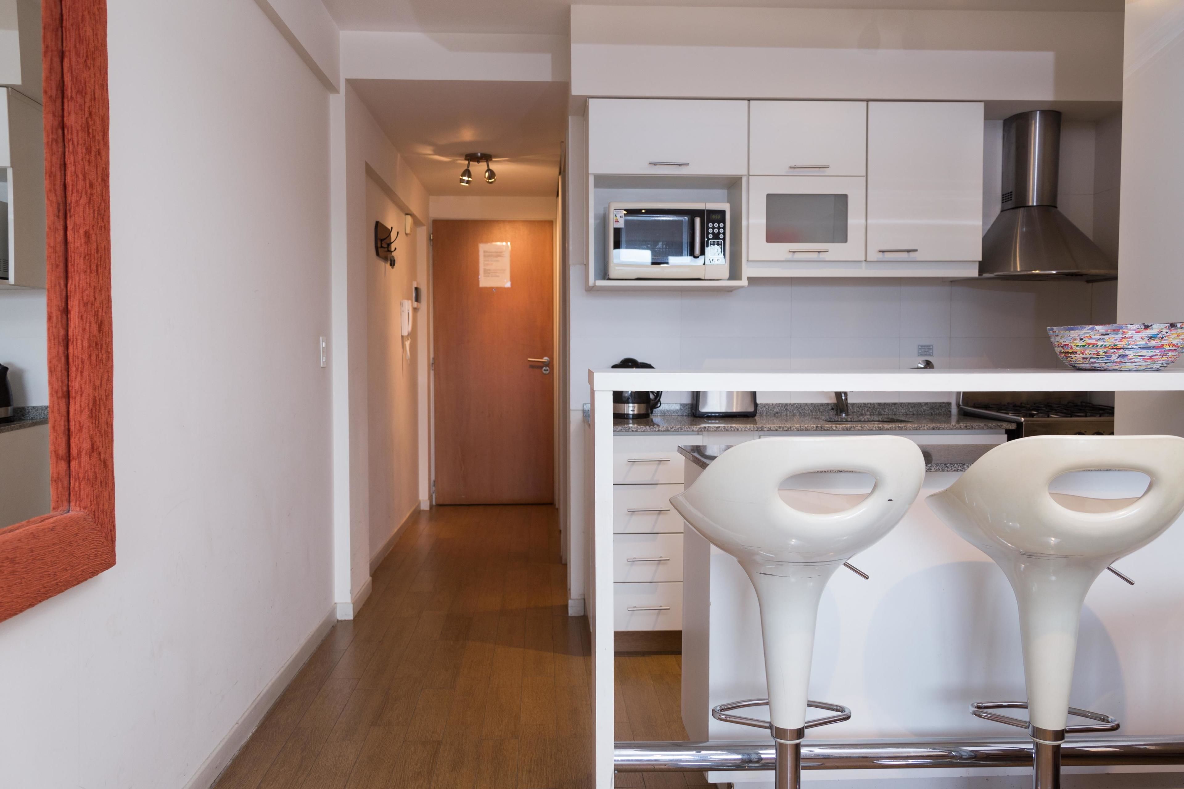 Apartamento, 1 quarto | Cozinha privada | Geladeira grande, micro-ondas, fogão, cooktop