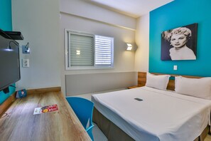 Quarto Duplo Standard | Minibar, cofre no quarto, cortinas/cortinados opacos 