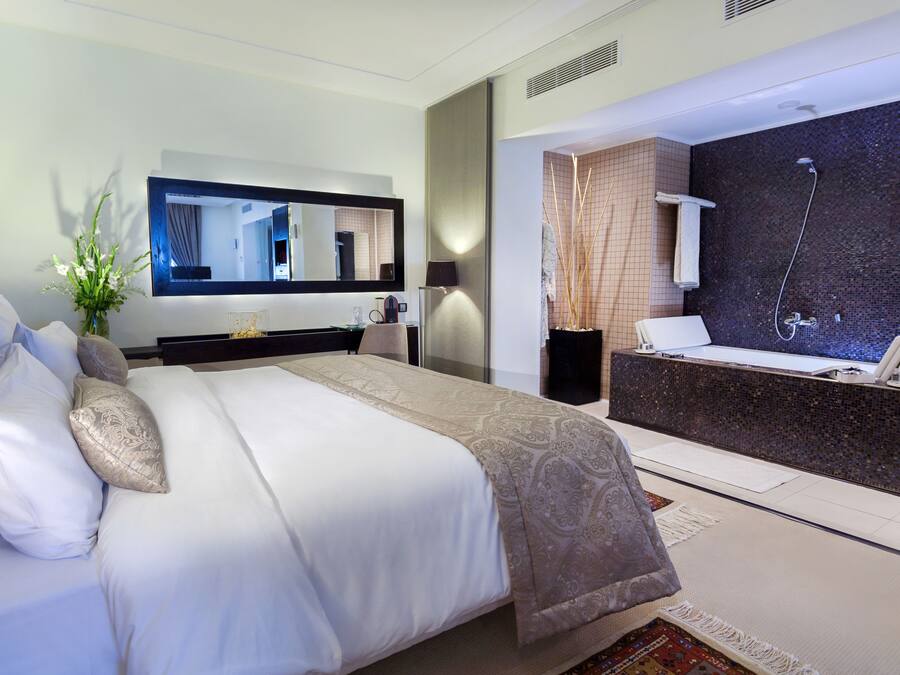 Suíte | Roupas de cama premium, frigobar, cofres nos quartos, cortinas blackout