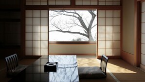 Um quarto japonês tradicional com piso de tatame, uma mesa baixa e portas deslizantes.