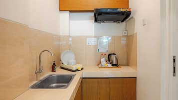 Suite Premier | Roupa de alta qualidade, minibar, cofre no quarto, secretária