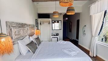 Quarto Deluxe, vista para o mar | Roupa de alta qualidade, minibar, cofre no quarto, Wi-fi grátis