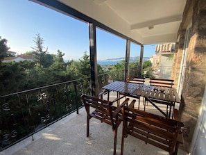 Apartamento executivo, vista para o mar | Terraço/pátio