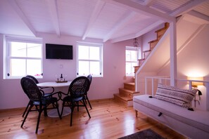 Apartamento real, cozinha americana | 1 quarto, roupas de cama premium, frigobar, cofres nos quartos