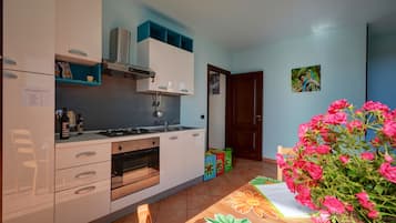 Apartamento, 1 quarto, sacada, vista para a montanha | Cozinha privada