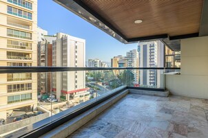 Suite Familiar, 2 quartos, fumadores, kitchenette | Vista para a cidade