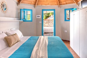 Bangalô, 1 quarto | Cortinas blackout, berços (sobretaxa), Wi-Fi de cortesia, roupa de cama