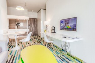 Apartamento superluxo | Área de estar | TV de tela plana