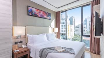 Suíte, 1 quarto | 1 quarto, roupas de cama premium, cofres nos quartos, escrivaninha