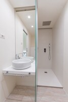 Quarto Duplo Deluxe, 1 quarto | Casa de banho | Um polibã, um secador de cabelo (mediante pedido), um bidé 