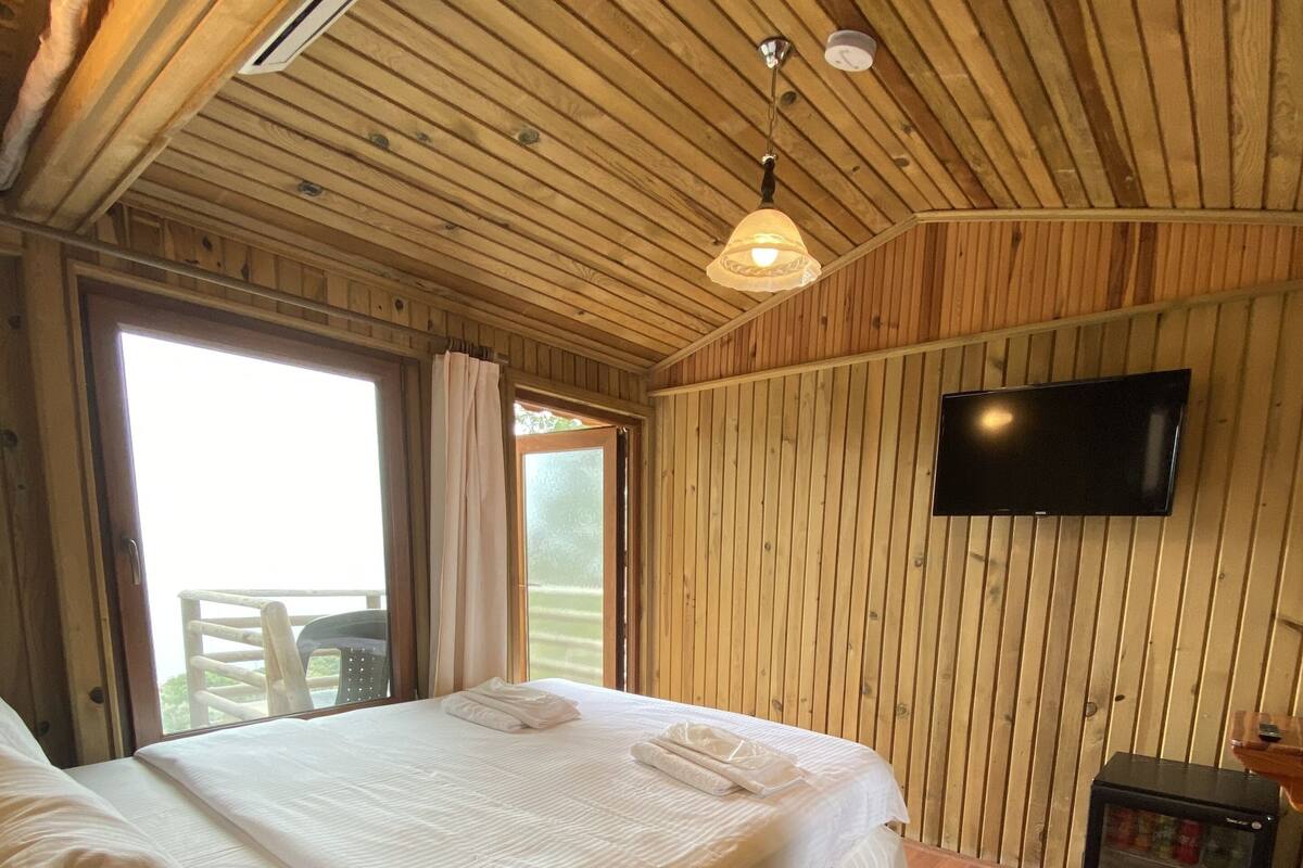 Bangalô, vista para o mar (For 2) | Roupas de cama premium, frigobar (abastecido com alguns itens grátis)