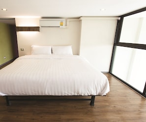 Dúplex, 1 quarto | Cofre no quarto, secretária, roupa de cama fornecida 