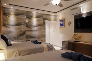 Quarto Quádruplo Comfort | Camas de colchão Select Comfort, minibar, cofre no quarto, Wi-fi grátis 