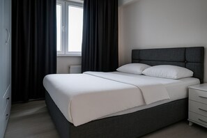 Apartamento Standard em Condomínio Fechado, varanda | 2 quartos, secretária, ferro/tábua de engomar, Wi-fi grátis 