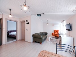 Suite Comfort | Sala de estar | Televisor 