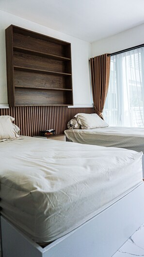 Quarto Twin Deluxe, Vista para a cidade | Wi-fi grátis