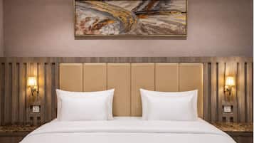 Apartamento, 2 quartos | Roupas de cama premium, frigobar, individualmente decorados