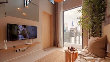 Loft premium, 2 quartos, sacada, vista para a cidade | Vista do quarto