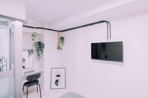 Apartamento, 1 quarto, para não fumantes, banheiro privativo | 1 quarto, escrivaninha, ferros/tábuas de passar roupa