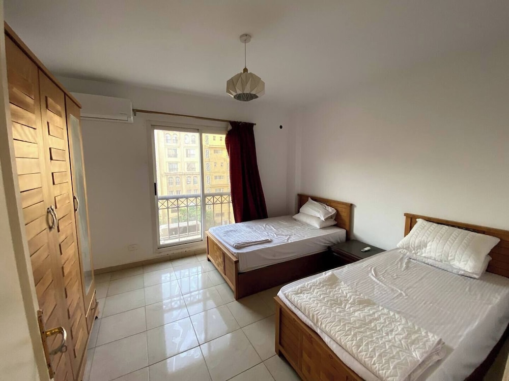 Spacious 2 Bedroom, 4 Beds with Wifi, ACs and Garden View - New Cairo | Vrbo