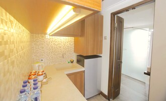 Quarto família, várias camas, cozinha americana | Cozinha privada | Lava-louças