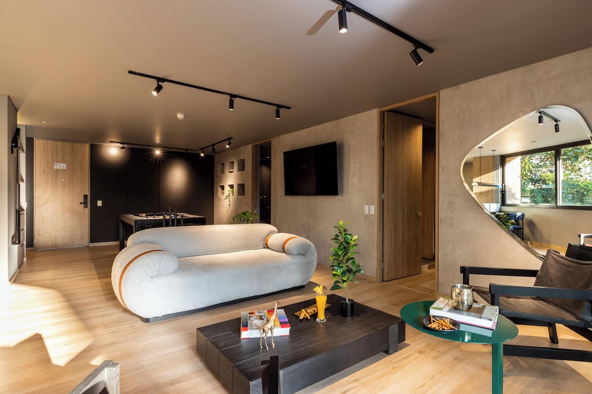 Apartamento elite | Área de estar | TV LED 45 polegadas com canais a cabo