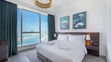 Apartamento superior, 2 quartos, vista para o mar, de frente para o mar | 2 quartos, ferros/tábuas de passar roupa, berços (sobretaxa)
