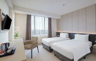 Quarto duplo luxo, vista para a cidade