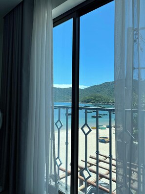Quarto casal luxo de uso individual, vista para o mar | Terraço/pátio