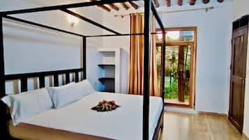 Quarto Duplo Deluxe, vista para o jardim | 1 quarto, roupa de cama fornecida