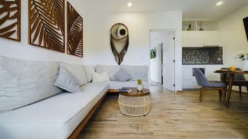 Apartamento, vista para o mar | Área de estar