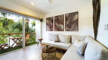 Apartamento, vista para o mar | Sala de estar