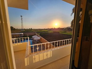 Suite Superior, vista para a piscina | Vista do quarto