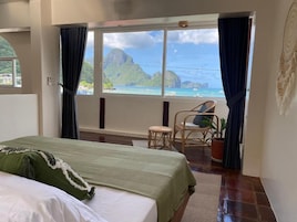 Quarto Superior, vista para a praia | Ferro/tábua de engomar, Wi-fi grátis, roupa de cama fornecida 