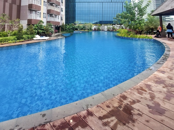 Restful And Comfy Studio Podomoro City Deli Medan Apartment - Medan