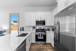 Apartamento Clássico | Cozinha privada | Uma torradeira 