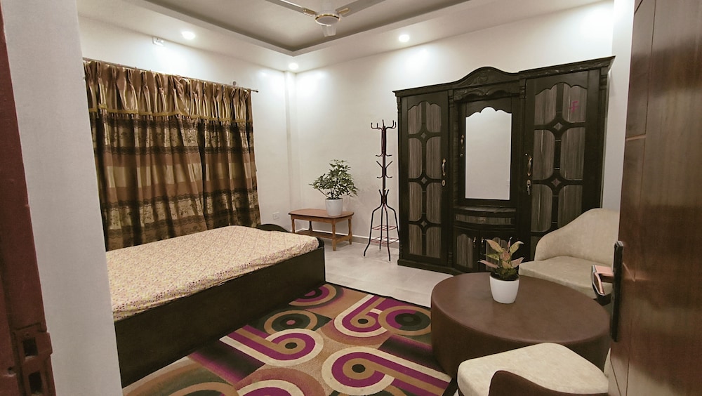 A Two-bedroom Home With A Living Room, Kitchen, And Garden Feels Like Home. - Tibet