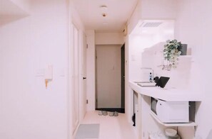 Apartamento, 1 quarto, não fumadores | Kitchenette privada | Minifrigorífico, um micro-ondas, uma placa de cozinha 