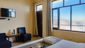 Quarto casal, sacada, vista para a montanha