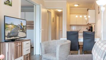 Apartamento | Cozinha privada | Uma cadeira de bebé