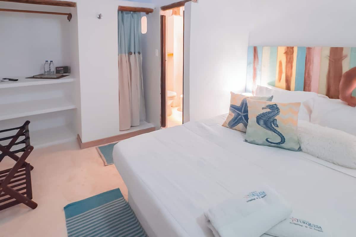 Quarto Quádruplo Comfort | Cofre no quarto, Wi-fi grátis