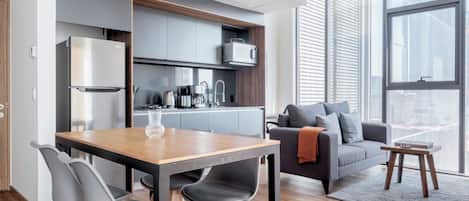 Apartamento conforto | Área de estar | Smart TV 40 polegadas com canais digitais