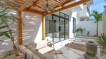 Villa, 1 quarto, vista para a piscina | Sala de estar