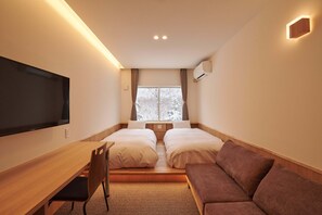 Quarto Twin Básico, vista para o jardim, no edifício anexo | Secretária, Wi-fi grátis, roupa de cama fornecida