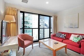 Apartamento | Área de estar | TV 42 polegadas com canais digitais