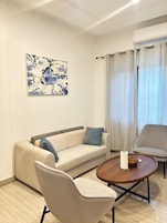 Apartamento Comfort, 1 quarto, varanda | Sala de estar | Televisor